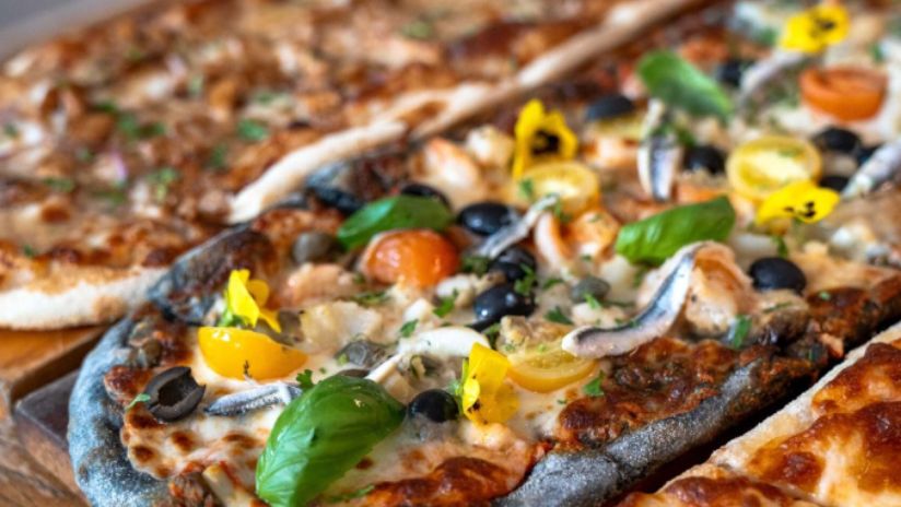 Riva Beach Club: Pizza Night Offer | HiDubai Deals